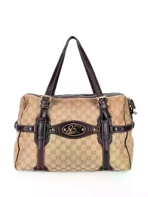 Gucci Gold Tone Travel Bags