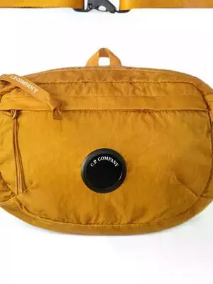 C.P. COMPANY Lens Detail Belt Bag - Yellow