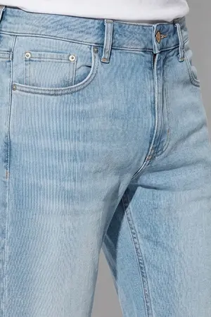 Emporio Armani Jeans With A Logo-shaped Appliqu