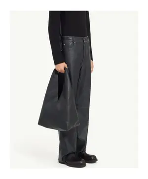 MAISON MARGIELA Leather-effect Trousers