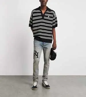 Amiri Staggered Logo Skinny Jeans