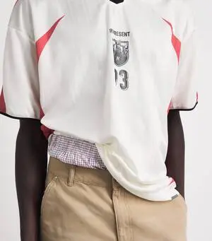 REPRESENT Spike Football Top