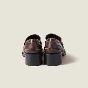 Miu Miu Logo-embossed Penny Loafers