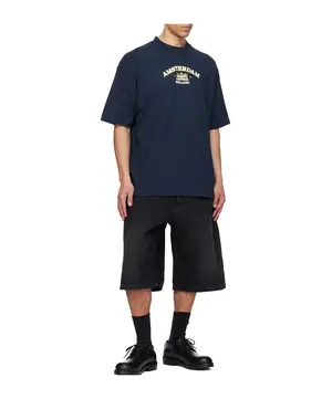 Vetements Faded Buttoned Denim Shorts With Appliqu