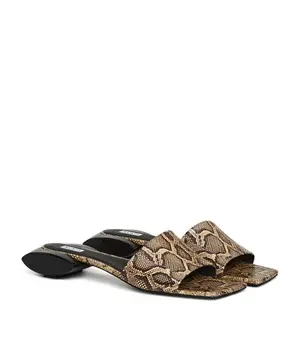 Alaïa Snakeskin Print Sculptural Heel Mules - Yellow