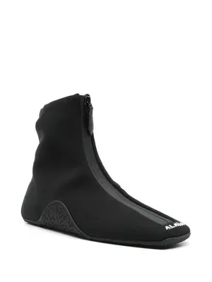 Alaïa Zipped Ankle Sneakers