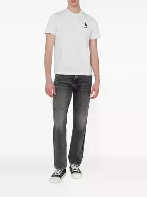Moschino Faded-effect Logo-patch Jeans