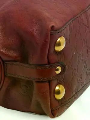 Gucci Guccissima Dome Bag With Crest Plaque