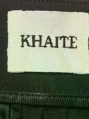 Khaite Wide-leg Pleated Trousers