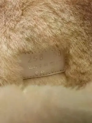 Prada Shearling Logo Plate Boots