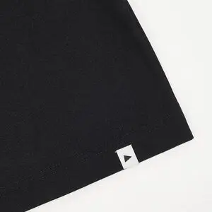 AND WANDER Large Logo Print T-shirt