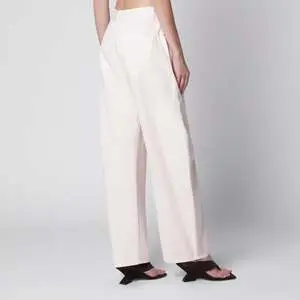Alaïa Rounded High-rise Cotton Denim Jeans
