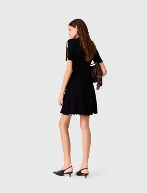 Maje Short Ribbed Knit Dress With High Neck And Flared Skirt