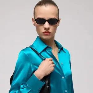 Gucci Oval Frame Sunglasses With Crystal Embellishments