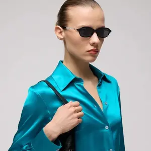 Gucci Oval Frame Sunglasses With Crystal Embellishments