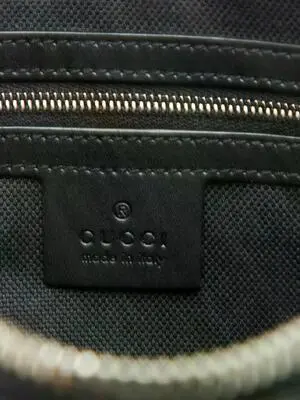 Gucci Gg Supreme Clutch Bag