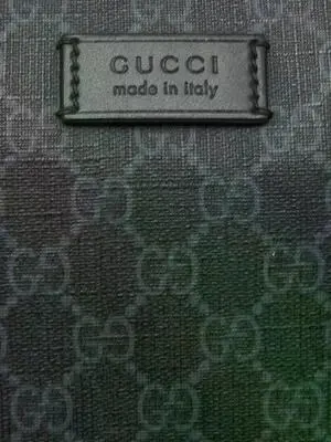 Gucci Gg Supreme Clutch Bag