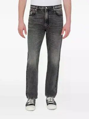 Moschino Faded Effect Logo Patch Jeans