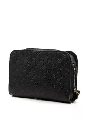 Gucci Embossed Leather Clutch Bag