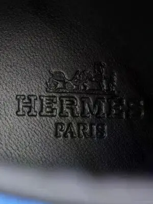 Hermès Freestyle High-top Leather Sneakers