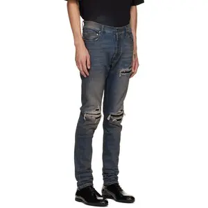 Amiri Distressed Skinny Jeans