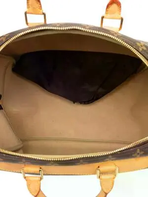 LOUIS VUITTON Monogram Evasion Travel Bag - Brown