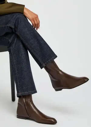 Khaite Colt Glossed Leather Ankle Boots