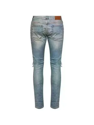Amiri Distressed-effect Patched Jeans