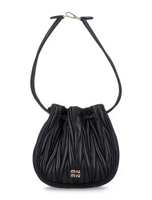 Miu Miu Quilted Lambskin Drawstring Handbag With Gold-tone Logo