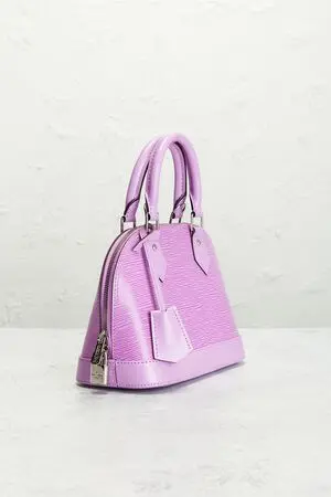 LOUIS VUITTON Epi Alma Bb Handbag In Purple
