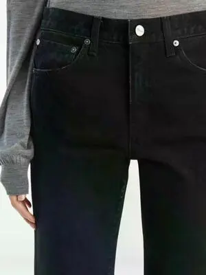 Khaite Flared-leg Cotton Jeans