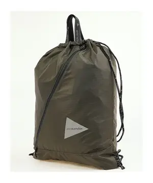 AND WANDER Drawstring Tote Bag