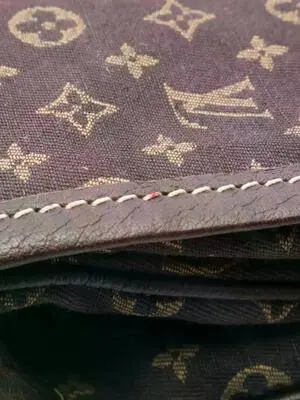 LOUIS VUITTON Monogram Mini Lin Saumur Xl Shoulder Bag
