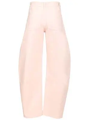 Alaïa Curved Dyed Denim Jeans