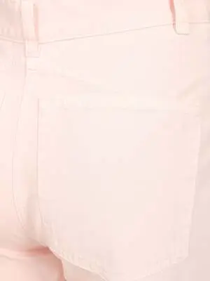 Alaïa Curved Dyed Denim Jeans
