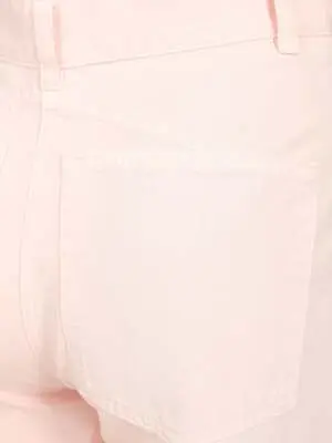 Alaïa Curved Dyed Denim Jeans