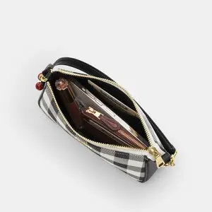 COACH OUTLET Nolita 19 With Gingham Print And Charm