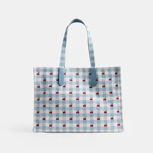 COACH OUTLET Tote Bag With Gingham Print - Gold/blue Multi