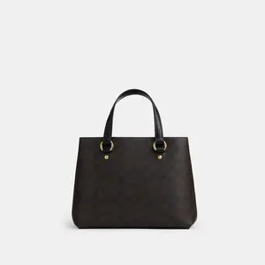 COACH OUTLET Station Carryall Bag In Signature Canvas - Gold/walnut/black