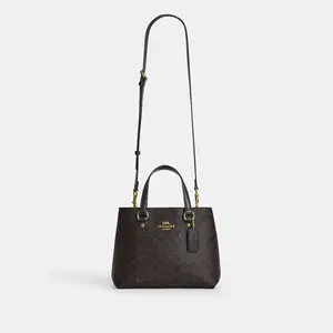 COACH OUTLET Station Carryall Bag In Signature Canvas - Gold/walnut/black