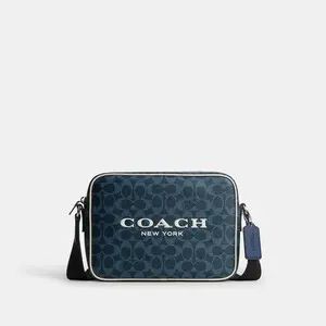 COACH OUTLET Colton Crossbody Bag 25 In Signature Canvas With Coach Graphic - Silver/ink Blue