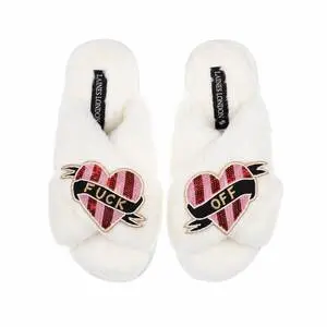 LAINES LONDON Faux Fur Cross Strap Slippers With Embellished Heart Brooches - White