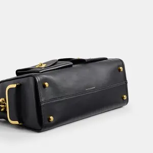 COACH Turnlock Haversack Bag - Brass/black