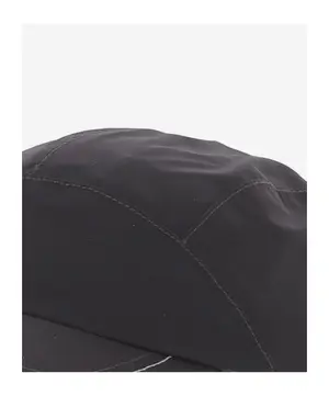 AND WANDER Drawstring Hat