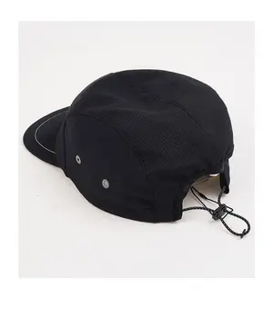 AND WANDER Logo Details On The Ventilated Hat