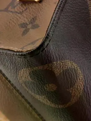 LOUIS VUITTON Onthego East West Shoulder Bag - Brown