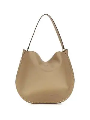 Isabel Marant Étoile Oskan Grained Calfskin Hobo Shoulder Bag With Studded Trim - Cream