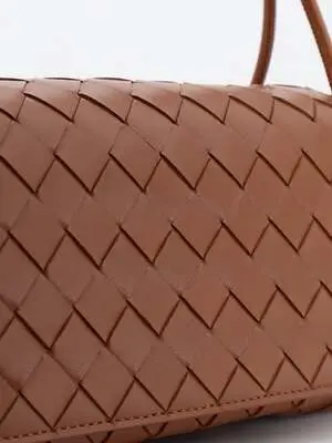Bottega Veneta Notturno Clutch Bag With Leather Shoulder Strap