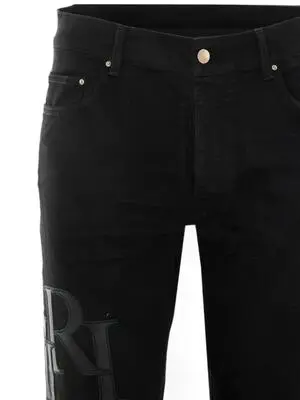 Amiri Logo-patch Waxed Jeans