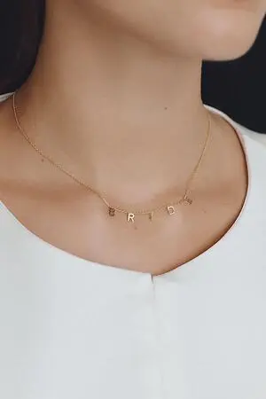 Anthropologie Bride Charm Necklace - Gold